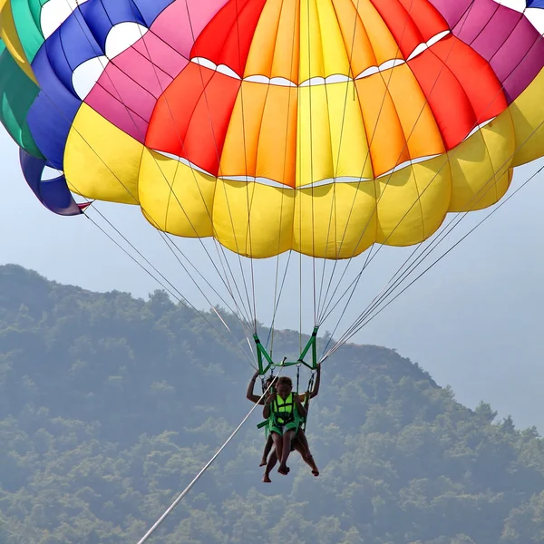 Parasailing in a blue sky - Stock Image - Everypixel