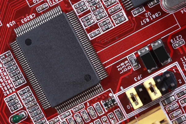 Close-up of electronic circuit red board with processor of compu ...