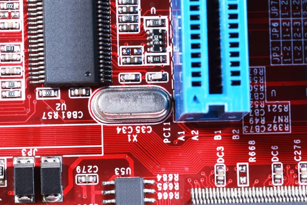 Close-up of electronic circuit red board with processor of compu ...