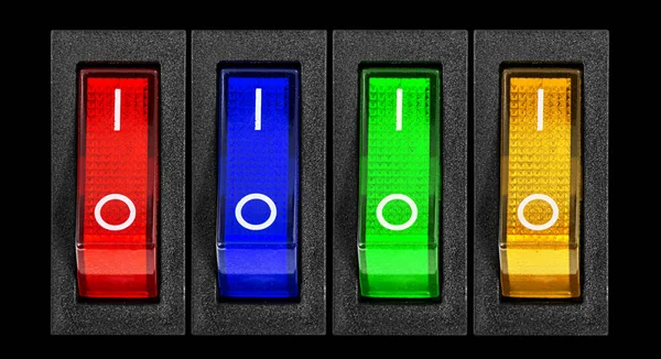 Red, blue, green and yellow power switches at ON position, isolated on ...