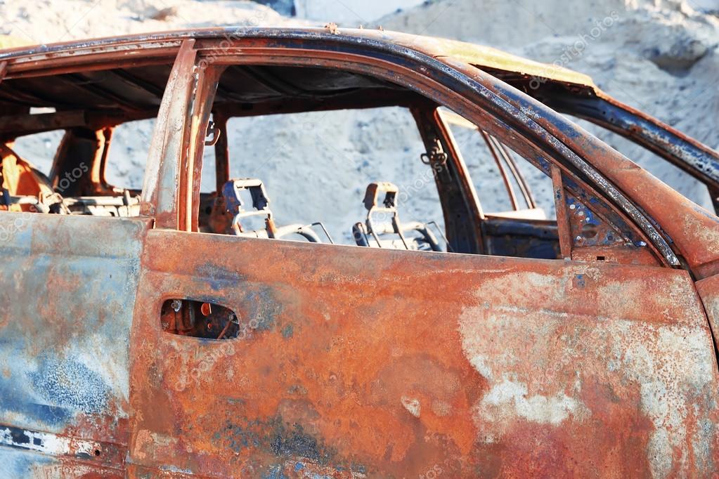 Rusty wrecked car Stock Photo by ©bozhdb 77502392