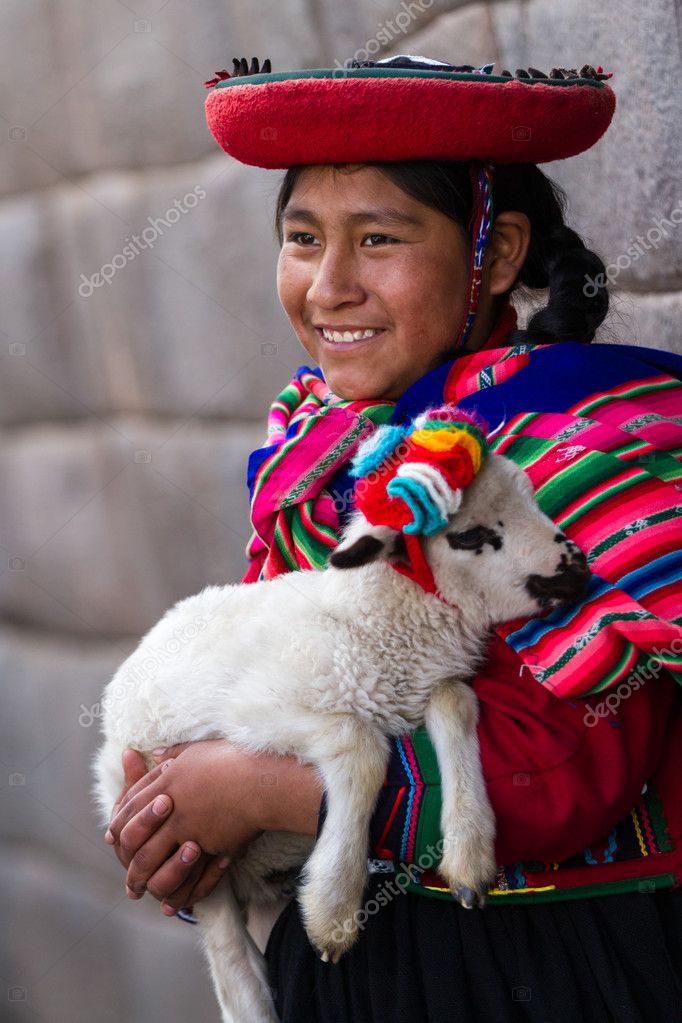 Native Peruvian holding a baby lamb – Stock Editorial Photo © wollertz ...