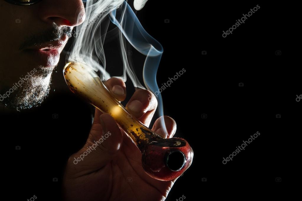 Smoking marijuana — Stock Photo © wollertz #55123323