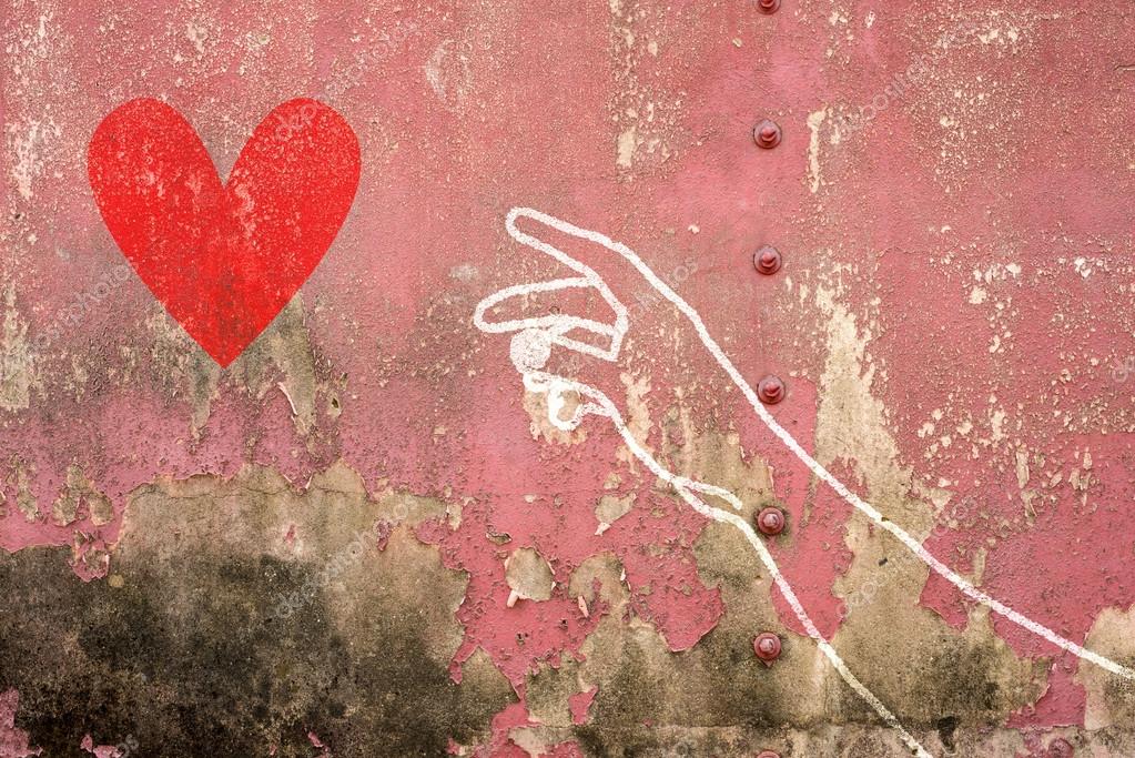 Hand and arm reaching for red heart , hand drawn on brick wall — Stock ...