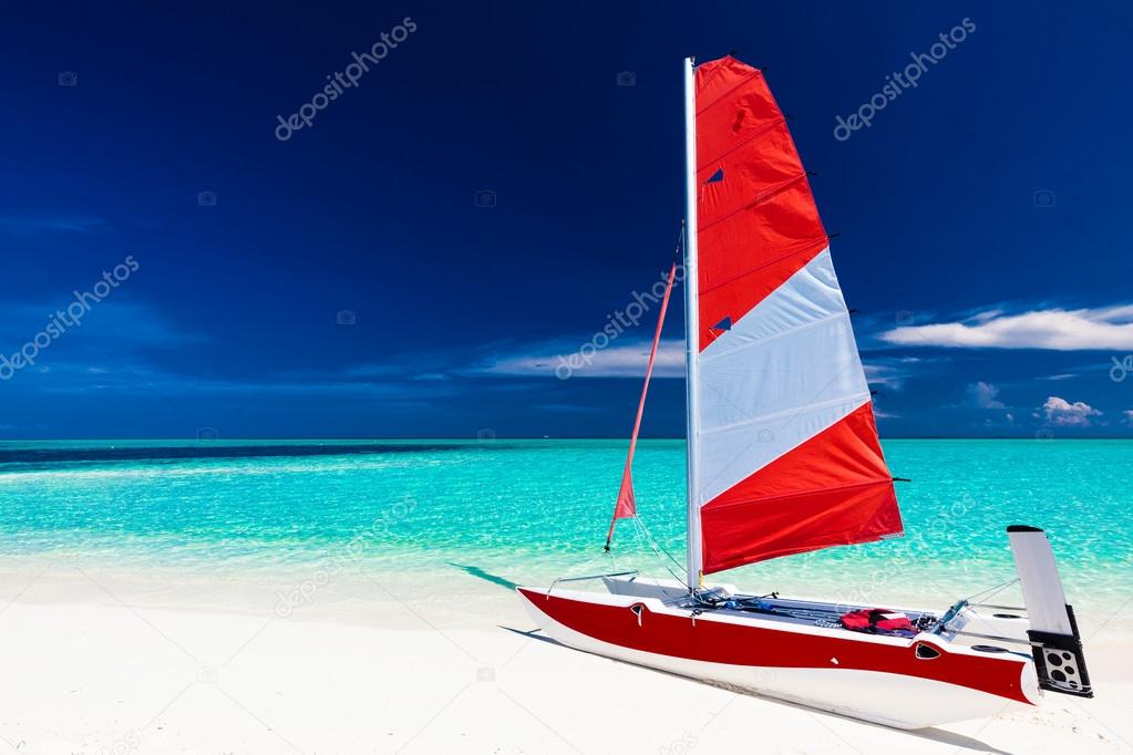 Sailing boat with red sail — Stock Photo © mvaligursky #102013868