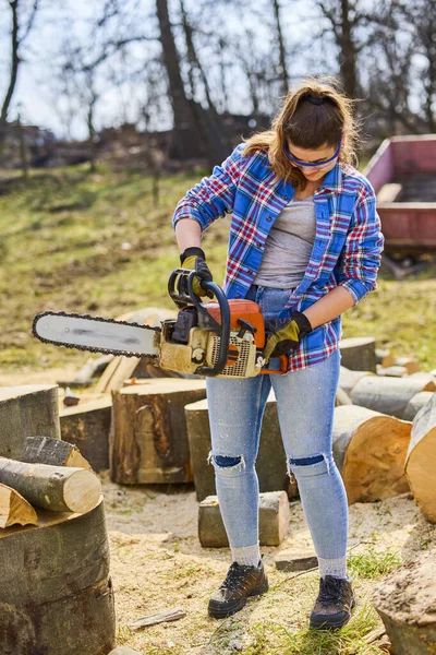 Woman chainsaw Stock Photos, Royalty Free Woman chainsaw Images ...