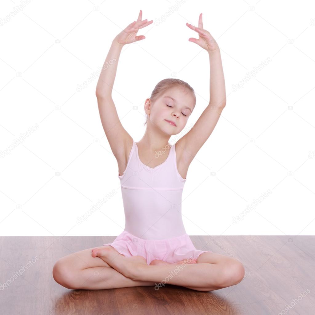 Little ballerina stretching Stock Photo by ©Mari1Photo 54952271