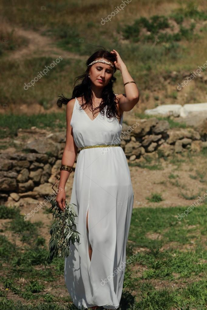 Greek woman in ancient town — Stock Photo © Mari1Photo #54955921