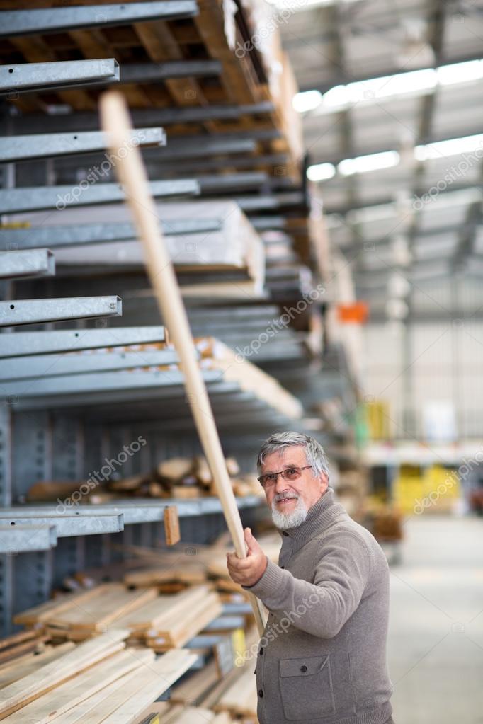 Man choosing and buying construction wood in a DIY store Stock Photo by ...