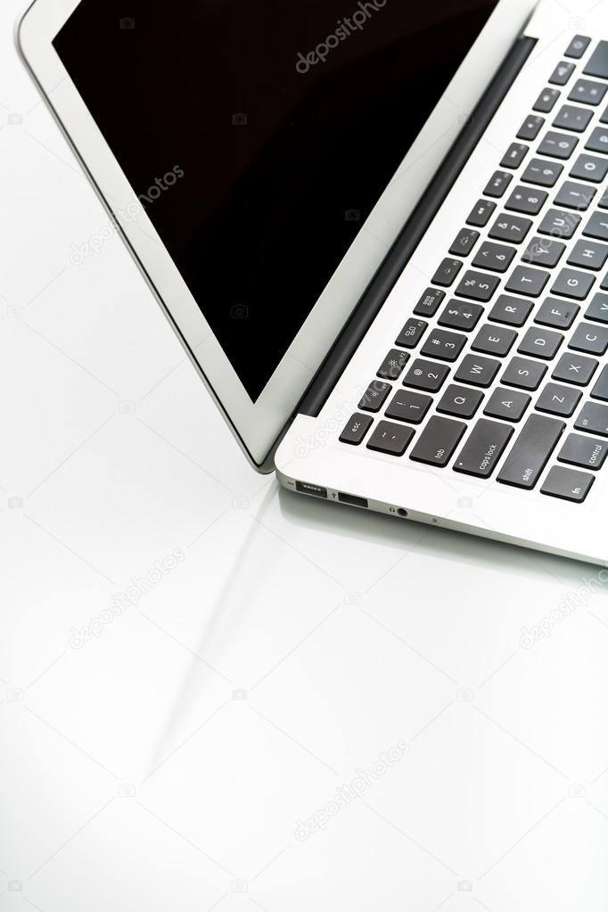Modern laptop computer on white — Stock Photo © lightpoet #65855393