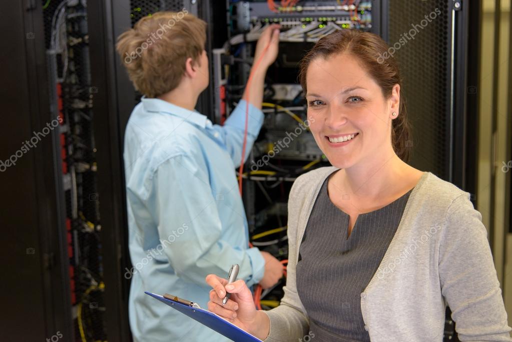 Two network engineers in server room — Stock Photo © CandyBoxImages ...