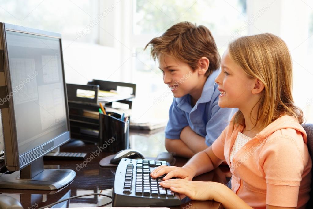 Young boy and girl using computer — Stock Photo © monkeybusiness #102722550