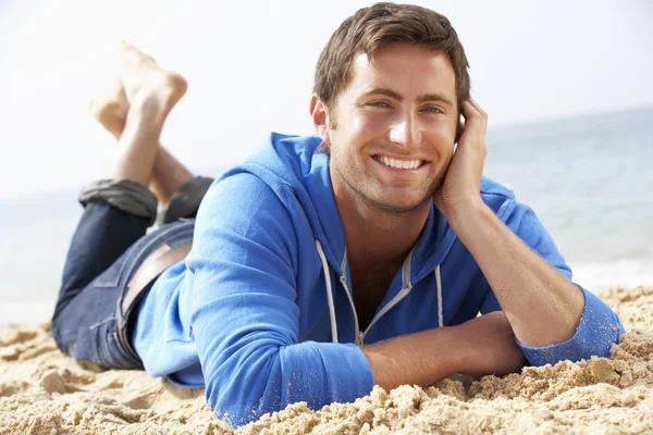 Man relaxing beach Stock Photos, Royalty Free Man relaxing beach Images ...