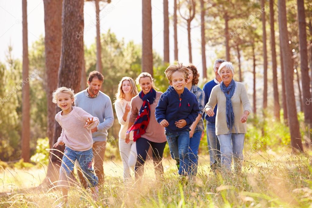 Multi-generation family walking in countryside — Stock Photo ...