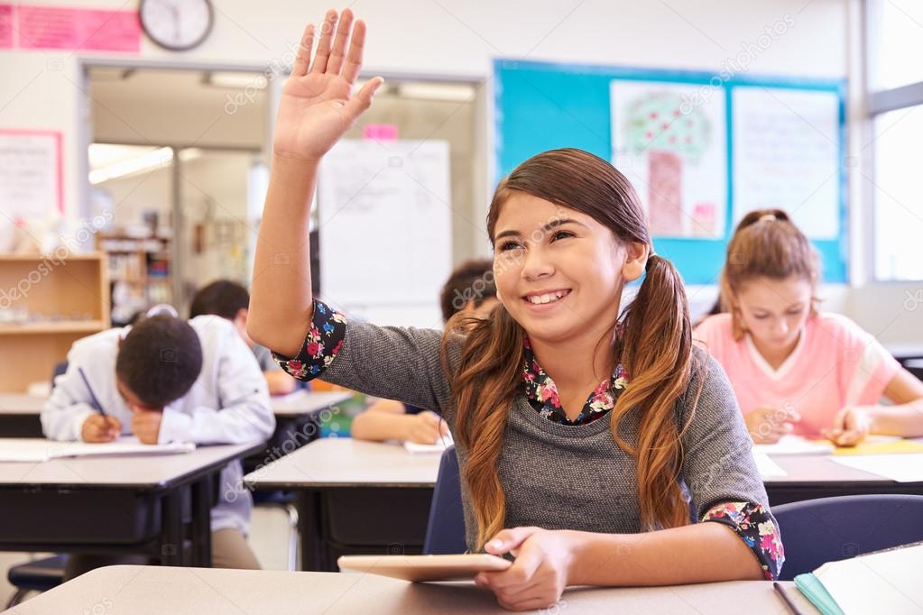 Girl in elementary school class Stock Photo by ©monkeybusiness 109951924