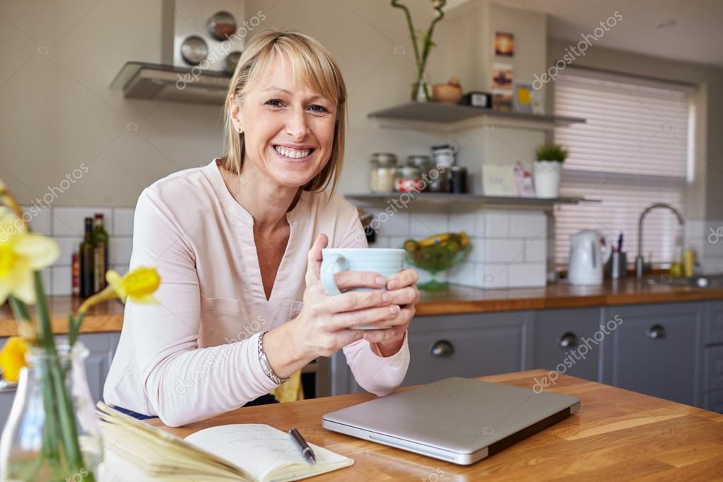 Woman Working From Home On Laptop — Stock Photo © monkeybusiness #109981014