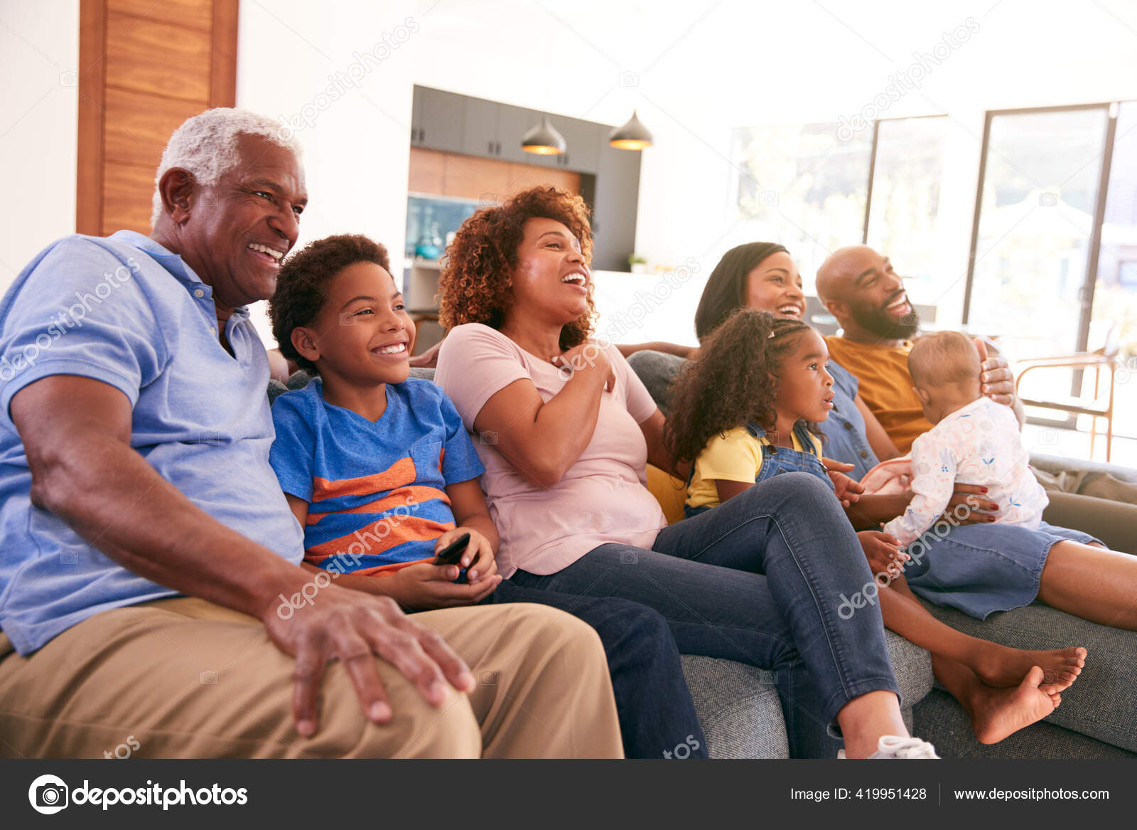 Black Family Watching Tv Together