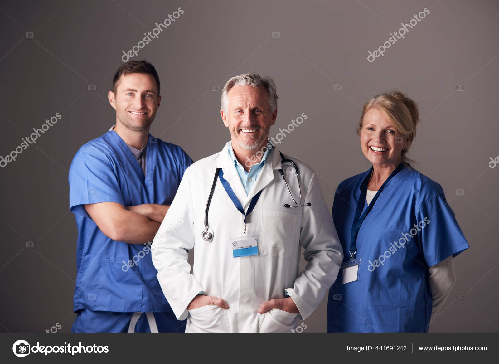 Studio Portrait Three Members Medical Team Wearing Scrubs Standing Grey ...