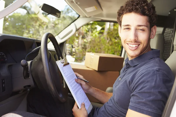 Delivery driver smiling Stock Photos, Royalty Free Delivery driver ...