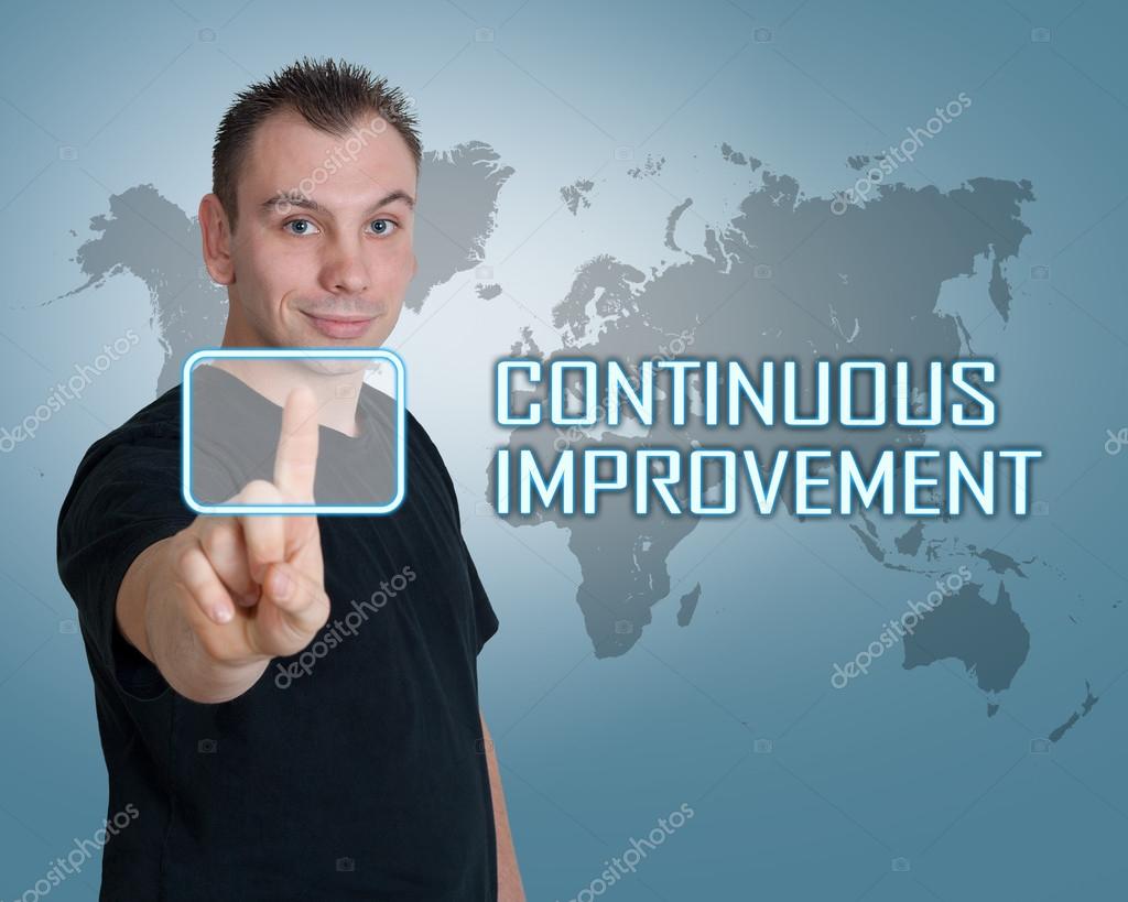 Young man press digital Continuous Improvement button on interface in ...