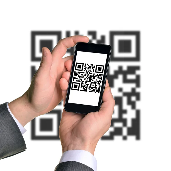 Hand Holding a Smartphone scanning qrcode Stock Photo by ©pingebat 78140744