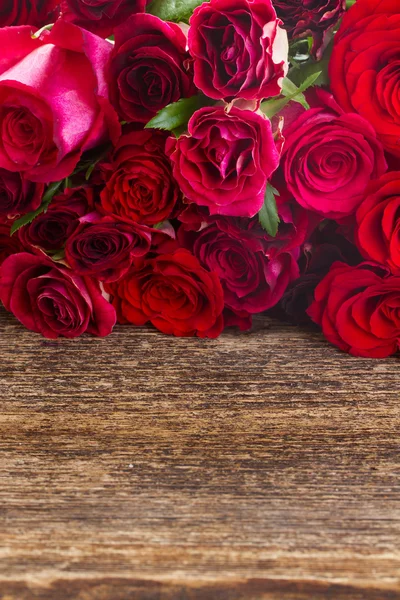 Pile of red roses — Stock Photo © Neirfys #86661292