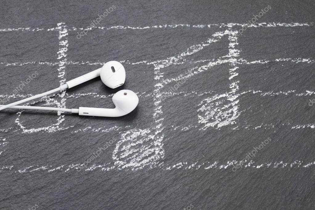 Music notes with headphones Stock Photo by ©Neirfys 95485938