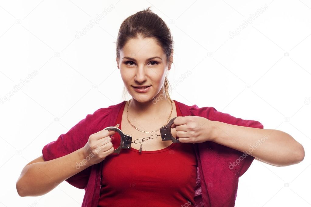 Young woman holding handcuffs — Stock Photo © seanika #65372593 Young woman holding handcuffs — Stock Photo © seanika #65372593