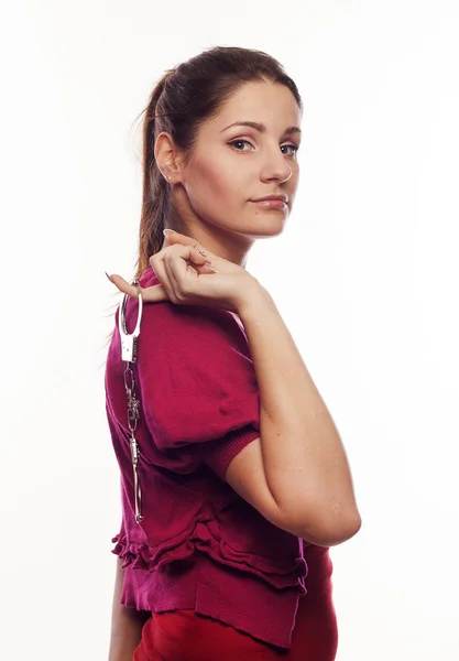 Young woman holding handcuffs — Stock Photo © seanika #65372593 Young woman holding handcuffs — Stock Photo © seanika #65372593