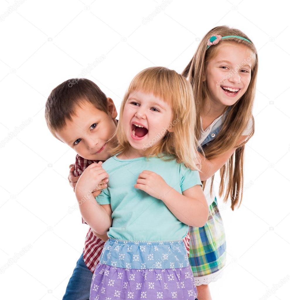 Three cute children smiling Stock Photo by ©GekaSkr 87503926