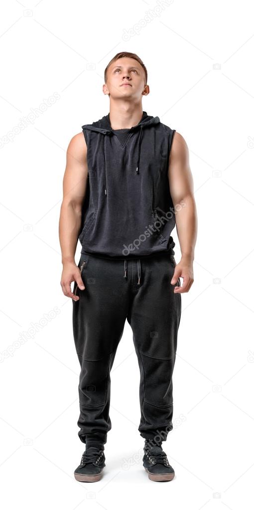 Full body portrait of handsome muscled young man looking up, isolated ...