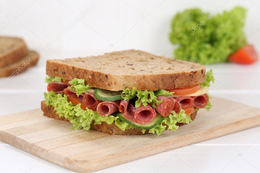 Sandwich toast bread for breakfast with salami — Stock Photo © Boarding2Now #94991426