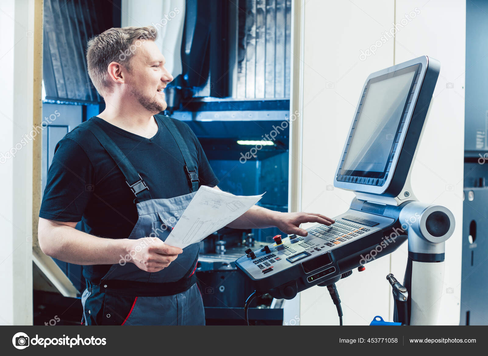 Machine operator programming modern industrial cnc lathe Stock Photo by ...