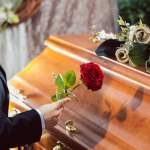 Rose on a tomb Stock Photo by ©oneinchpunch 42141991