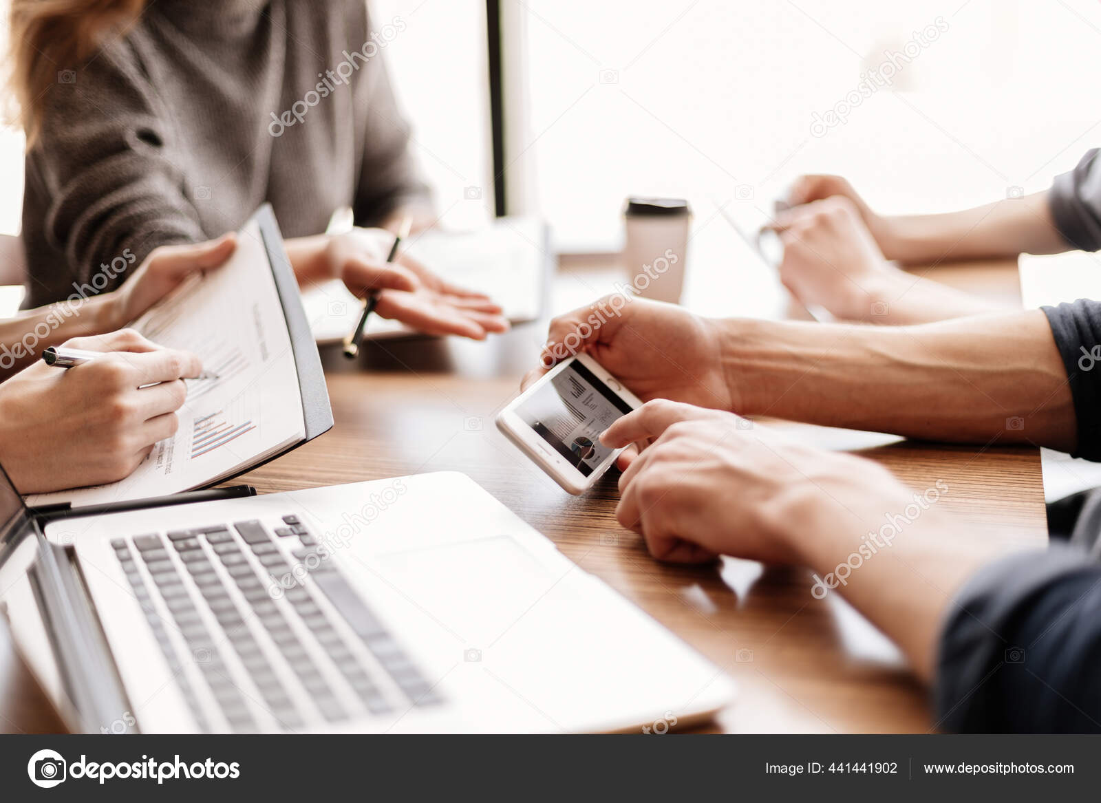Employee is using his smartphone to check the financial data. — Stock ...