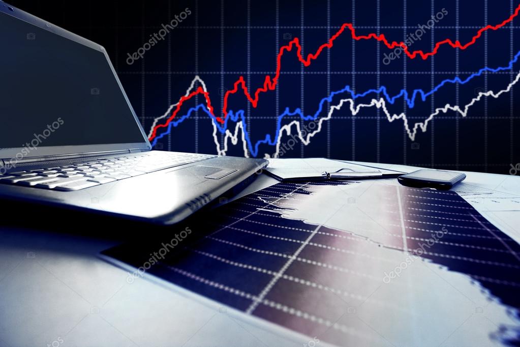 Graphs, charts, business table. The workplace of business people ...