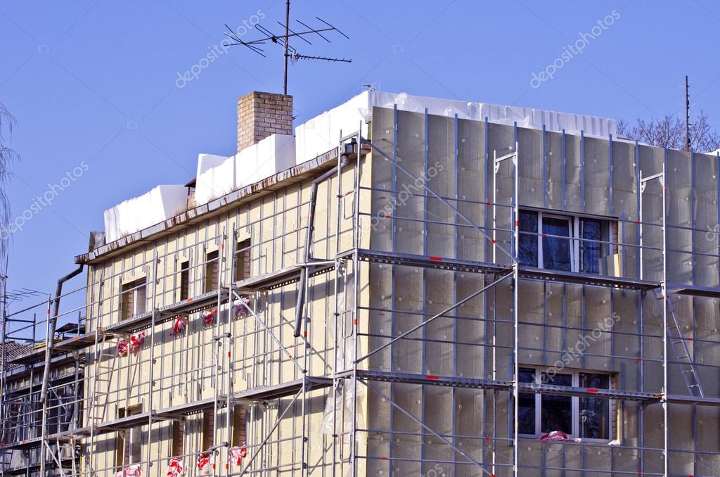 Old urban house renovation insulation works — Stock Photo © alisbalb2 ...