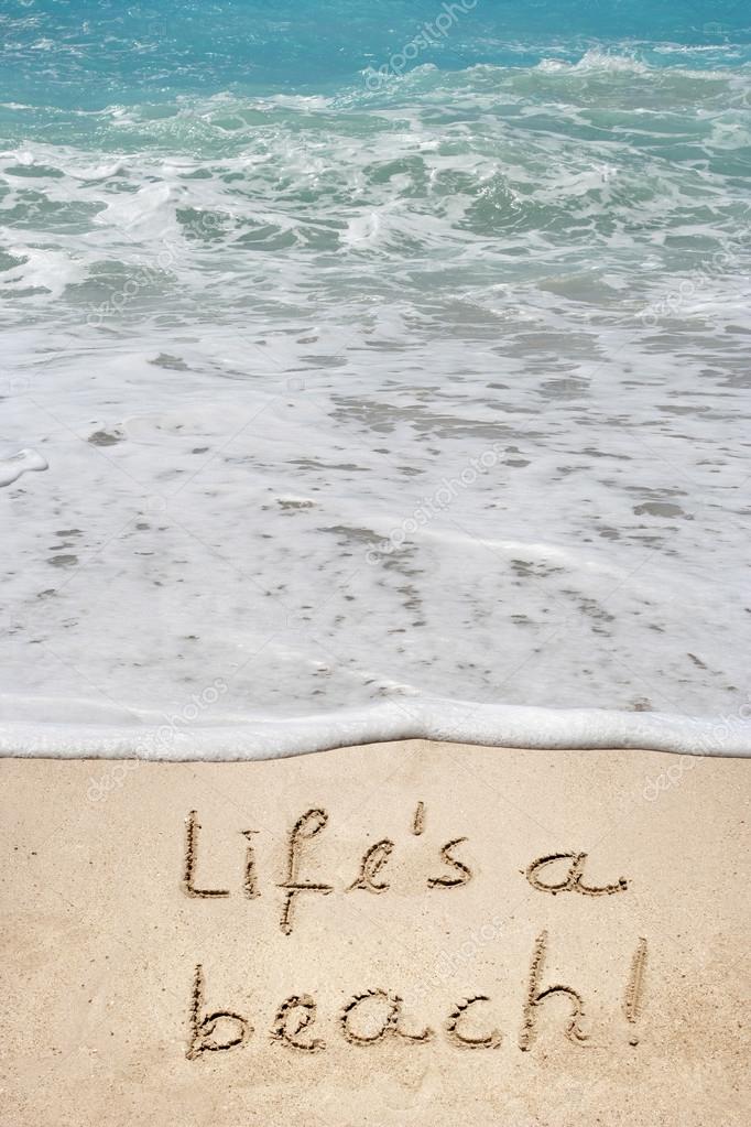 Handwritten life is a beach text Stock Photo by ©design36 83354970