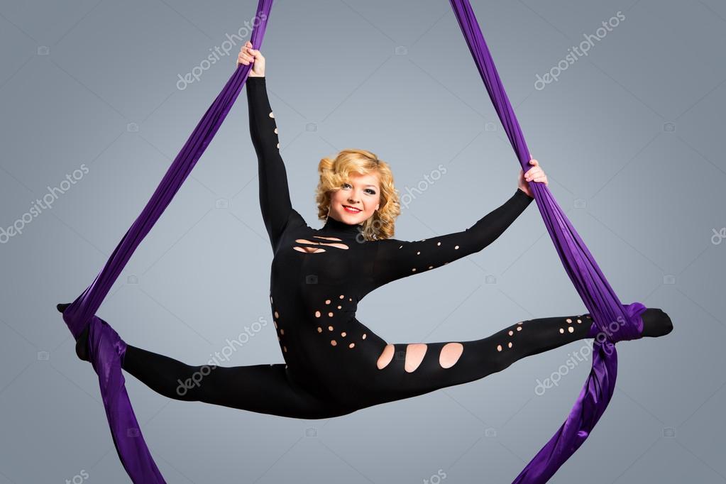 Beautiful dancer on aerial silk, aerial contortion, aerial ribbons ...