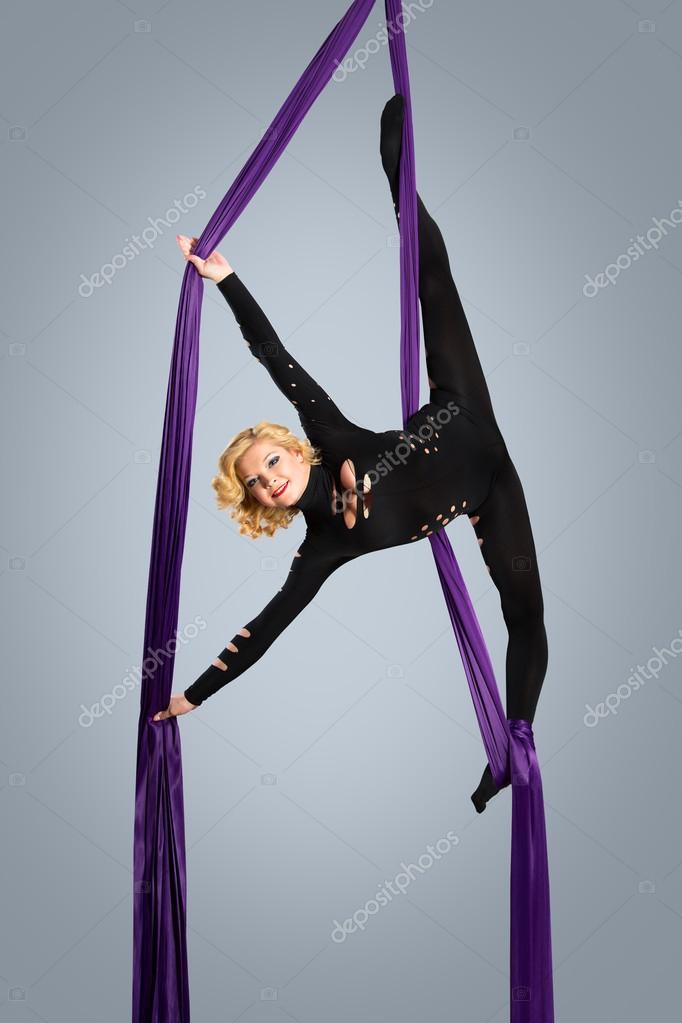 Beautiful dancer on aerial silk, aerial contortion, aerial ribbons ...