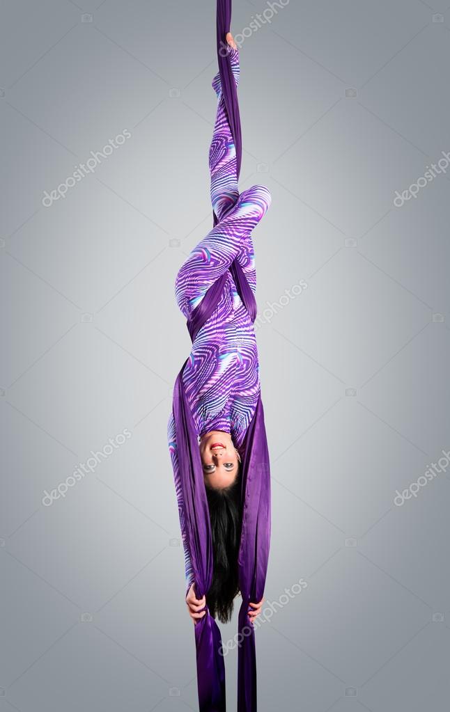 Beautiful dancer on aerial silk, aerial contortion, aerial ribbo ...