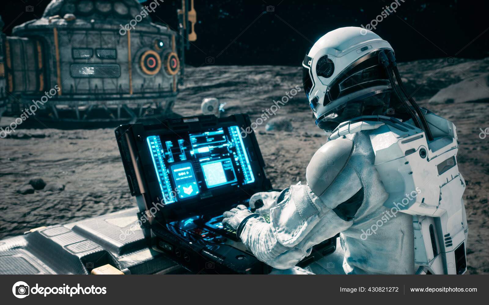 An astronaut works on his laptop at a space base on one of the new ...