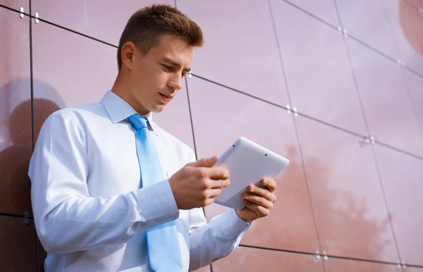 Businessman Looking Down at Tablet Computer - Stock Image - Everypixel