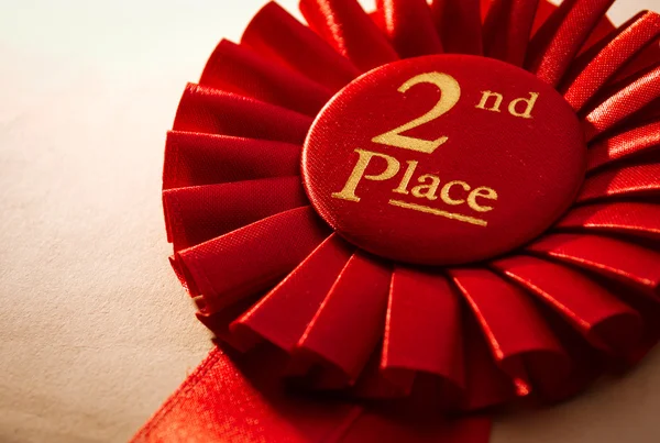 2nd place winners rosette or badge in red Stock Photo by ©serggn 53322919