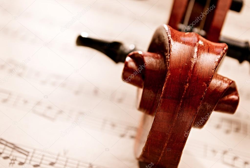 Carved Wooden Violin Scroll Resting on Sheet Music — Stock Photo ...