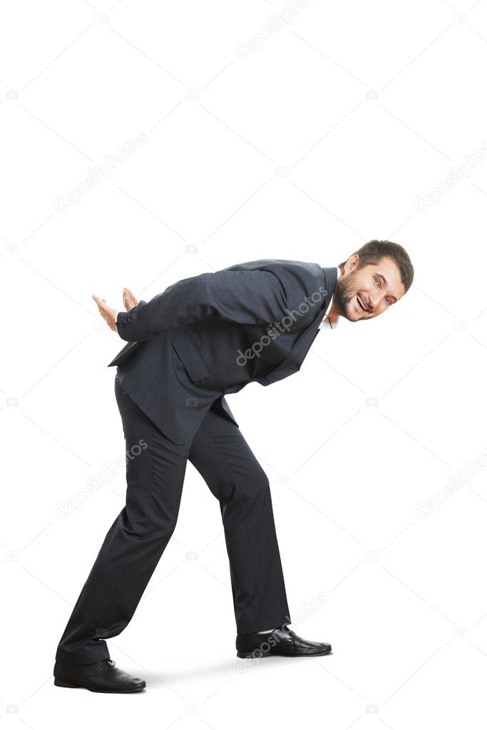 Man stooping down and walking — Stock Photo © konstantynov #52696775