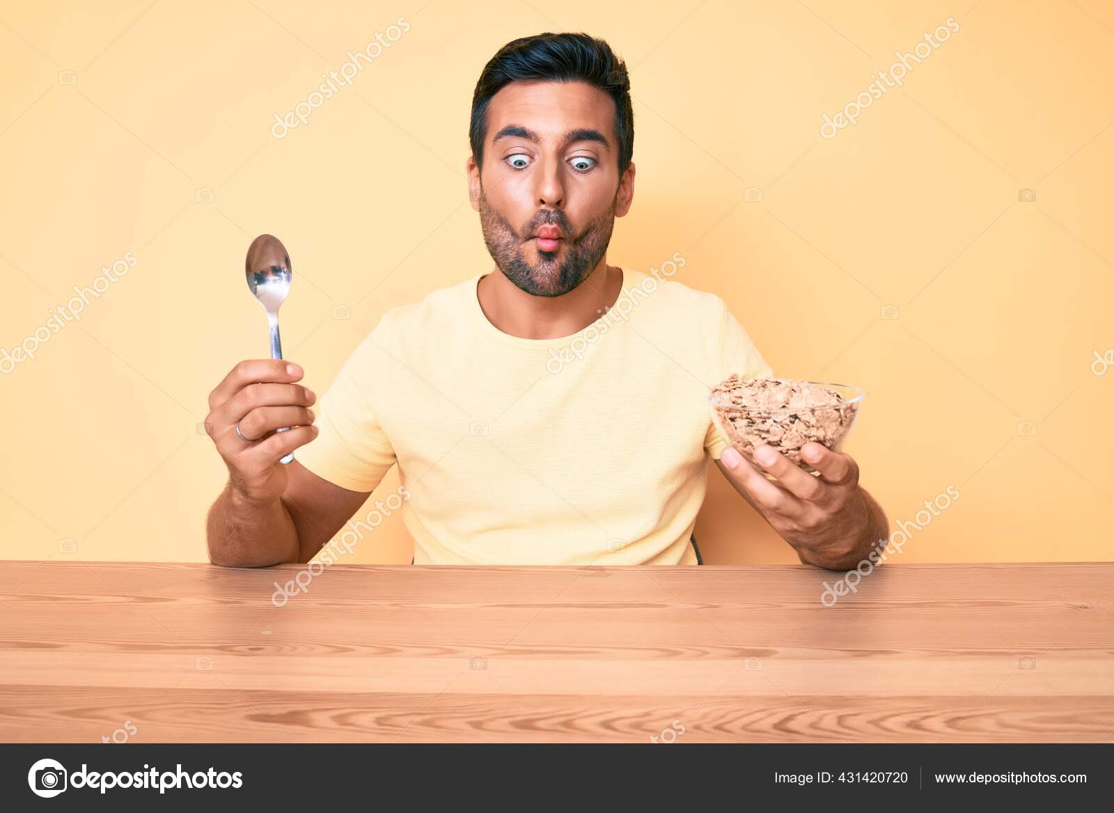 Bearded Man Eating Fish
