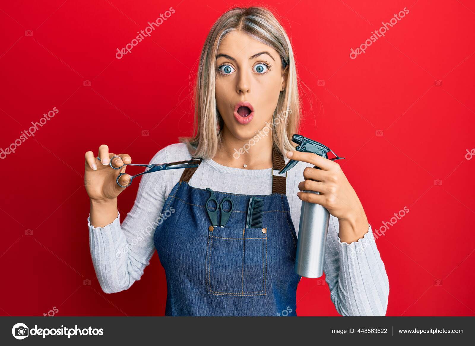 Beautiful Blonde Woman Wearing Hairdresser Apron Holding Scissors Afraid Shocked Stock Photo by ...