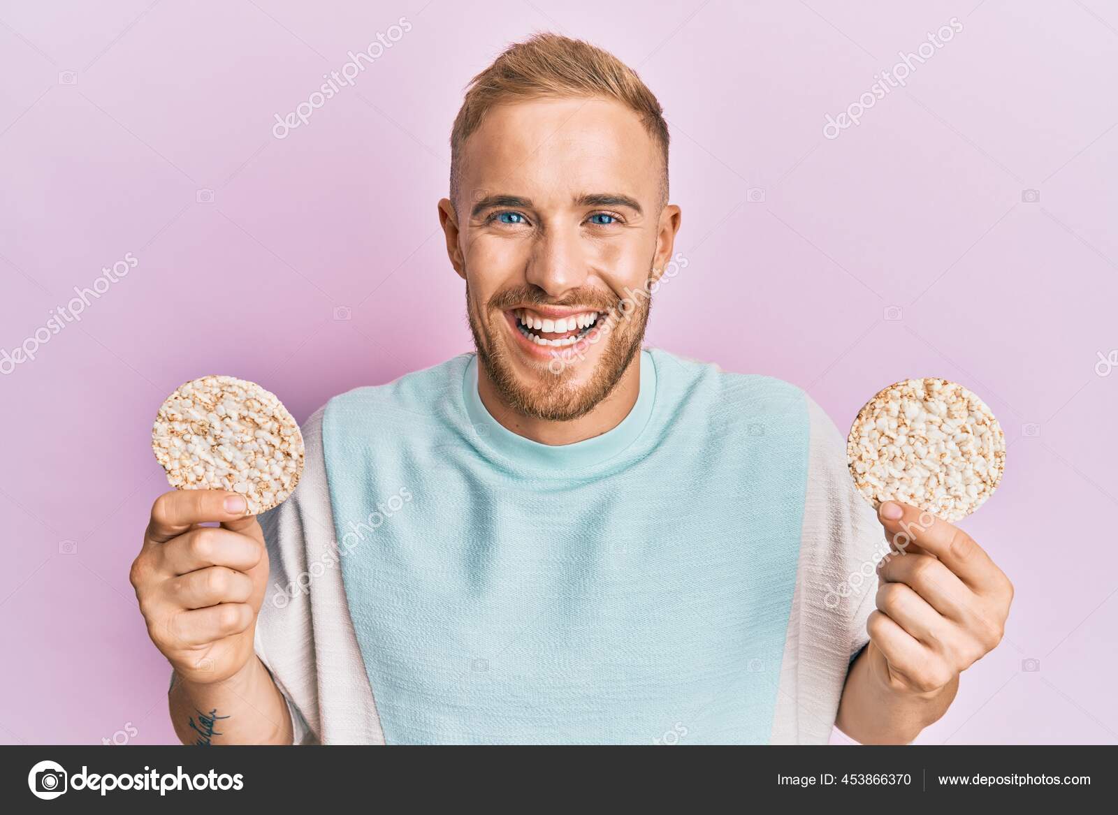 Young Caucasian Man Eating Healthy Rice Crackers Smiling Laughing Hard ...