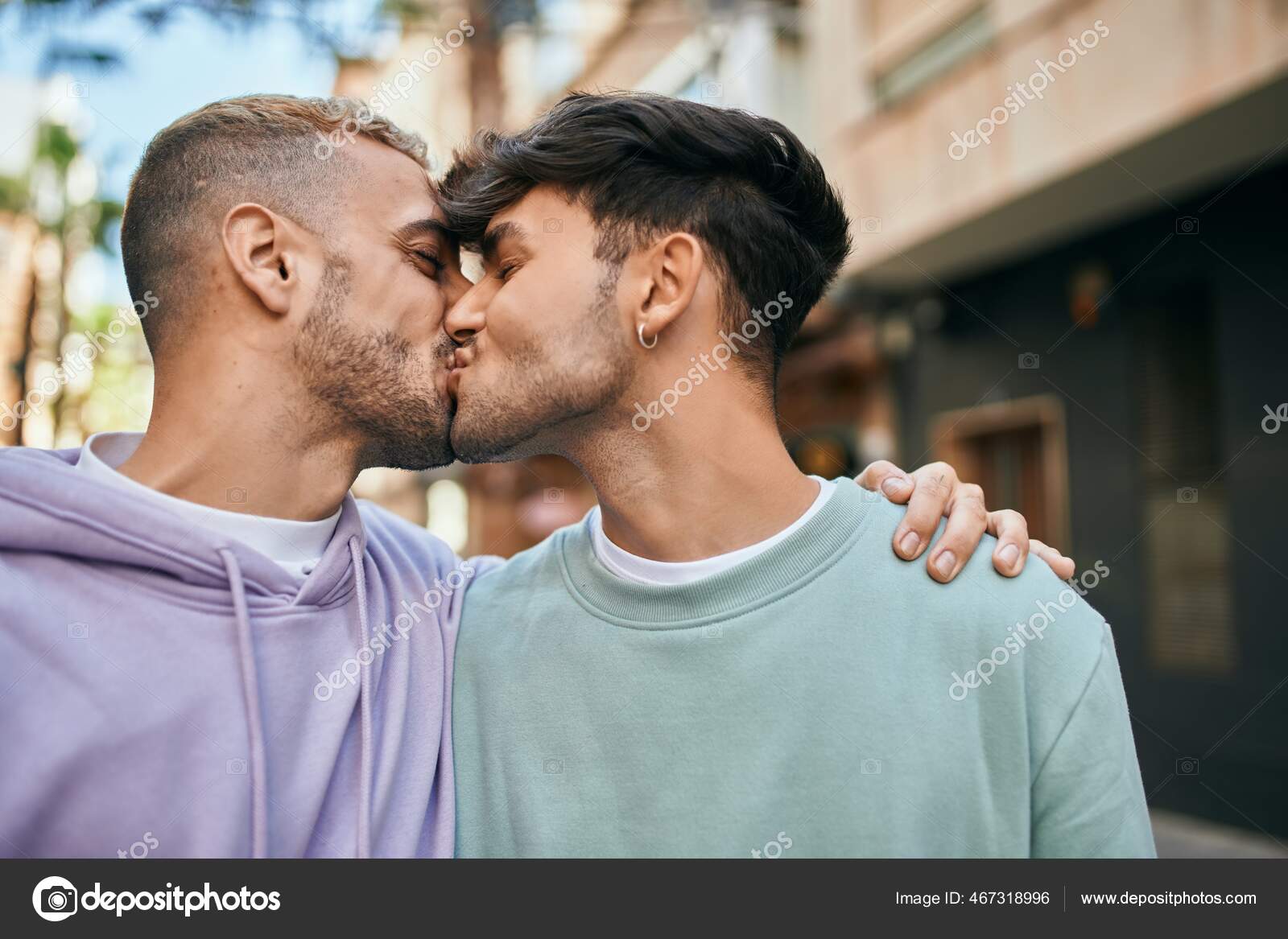 Young Gay Couple Hugging Kissing City Stock Photo by ©Krakenimages.com 467318996